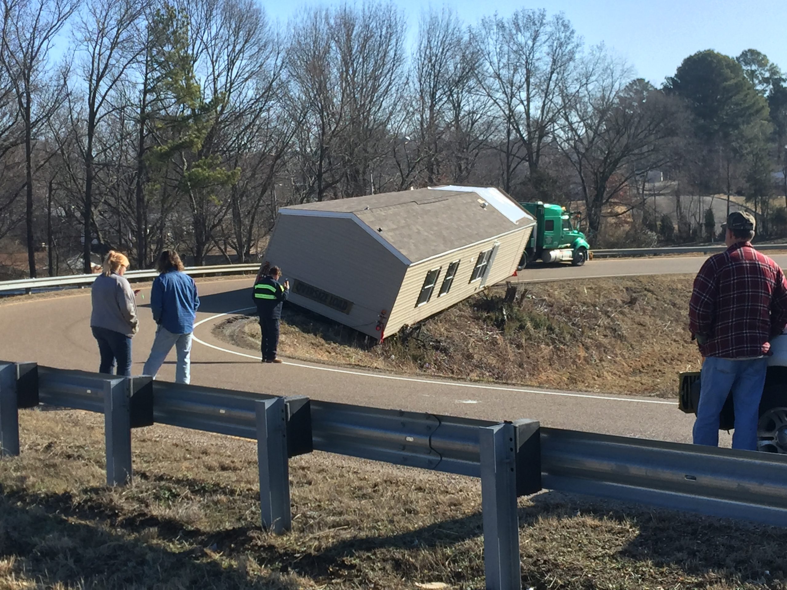 Mobile home slides off ramp at 45 Bypass & Hollywood Drive - Talk-N West TN
