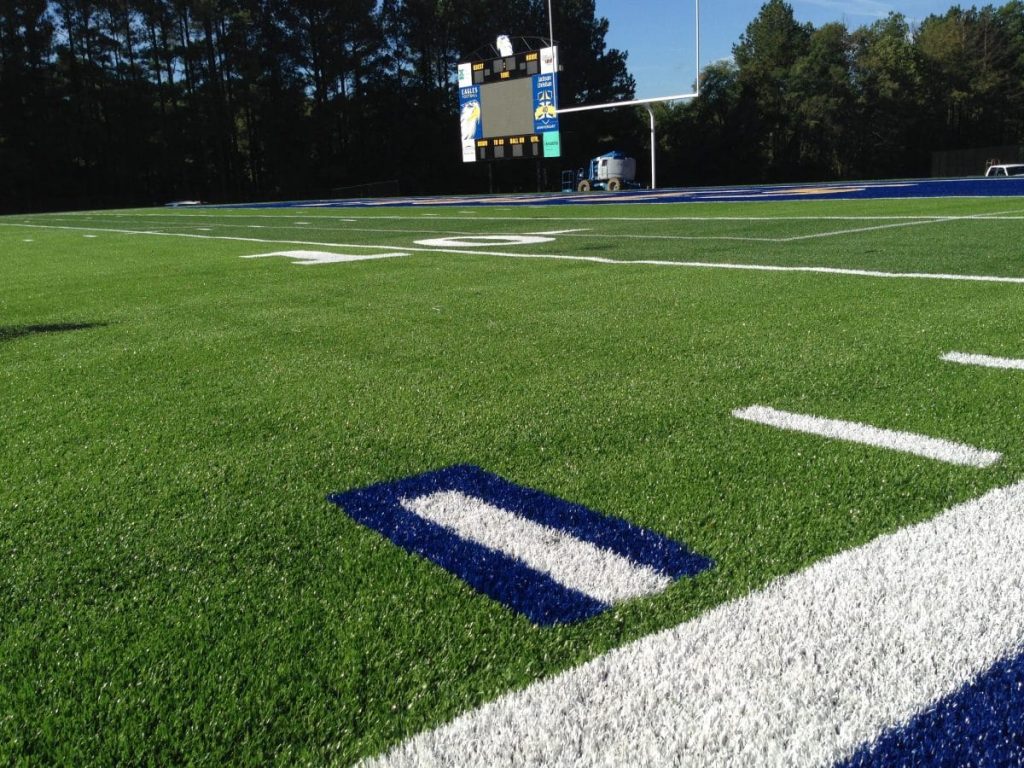 Remembering Ryder Lewis - 14-yard line markers bordered in blue on new ...