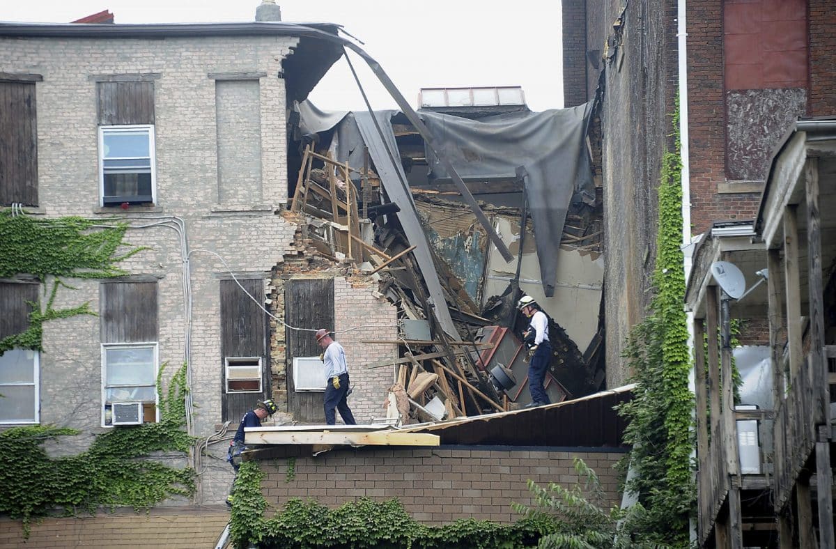 Woman trapped 9 hours in partial building collapse is freed - Talk-N ...